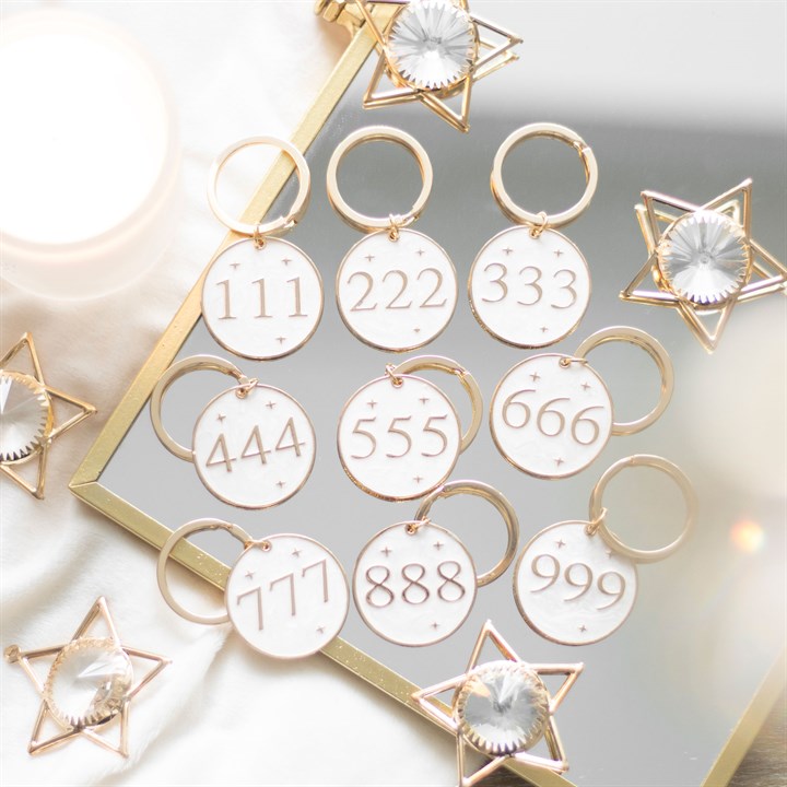 Set of 36 Angel Number Keyrings on Display - Something Different Wholesale